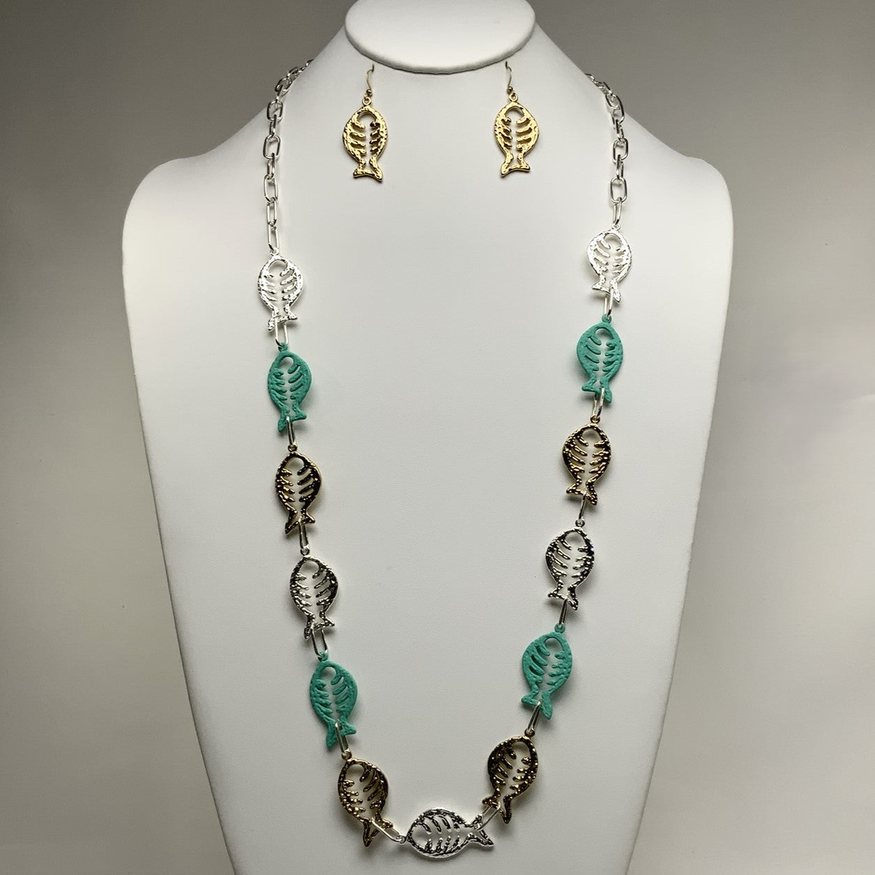 Long Chain Link with Metal and Rubber Coated Cut Out Bone Fish Spacers ...